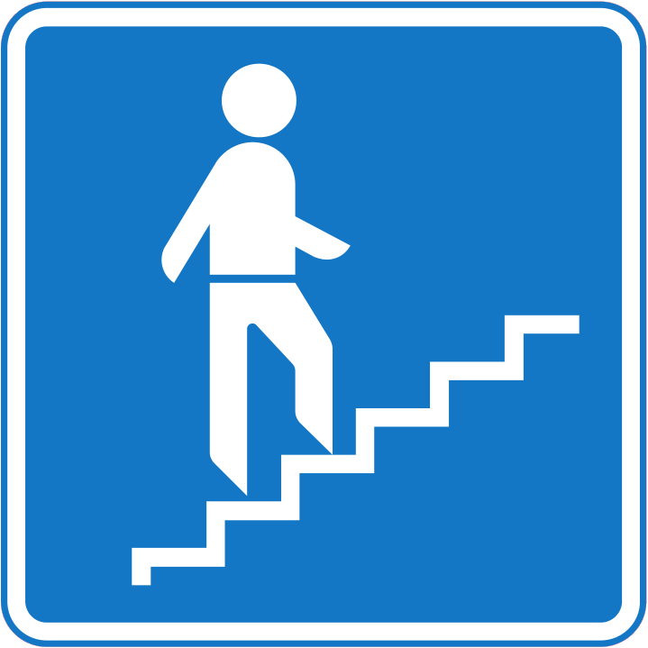 Stepped approach to a footbridge sign - UK Road Sign