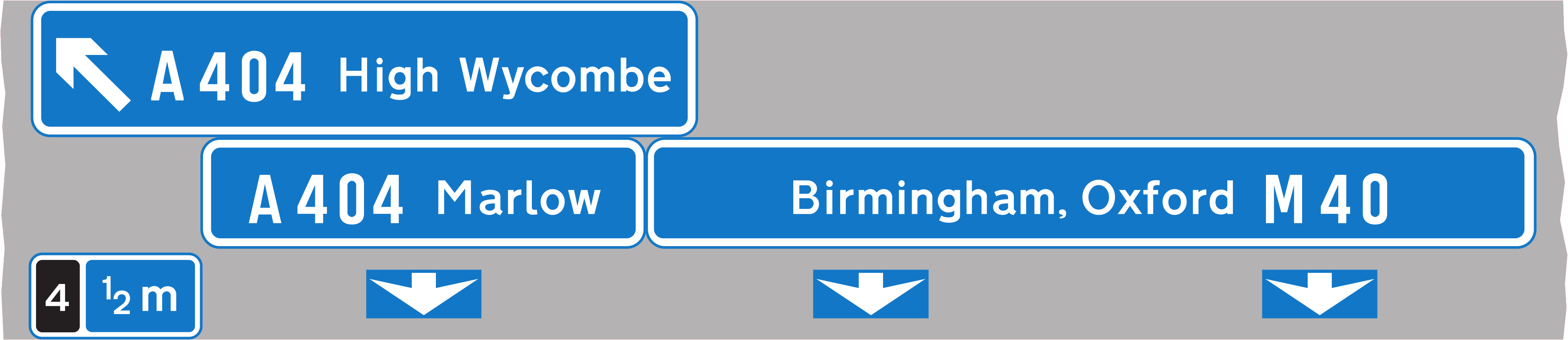 Overhead motorway sign that indicates a junction that has two exits ...
