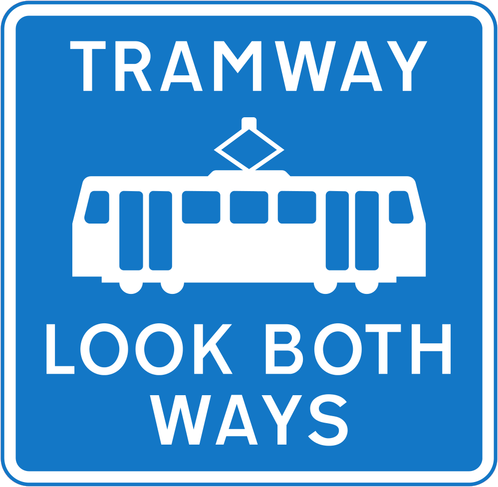 Look out for trams approaching from both directions sign - UK Road Sign